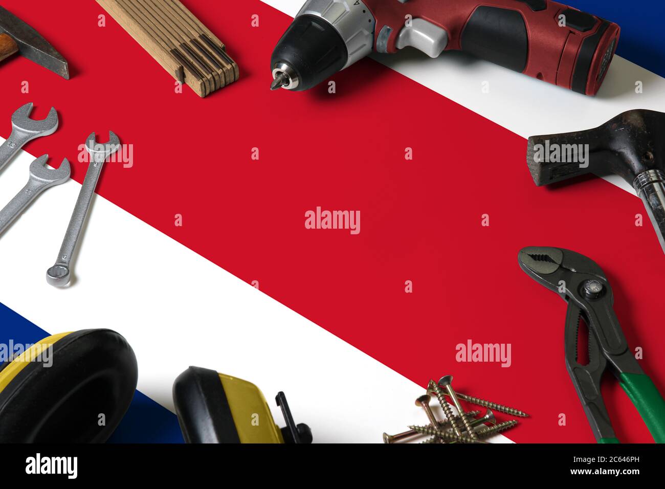 Costa Rica flag on repair tool concept wooden table background ...