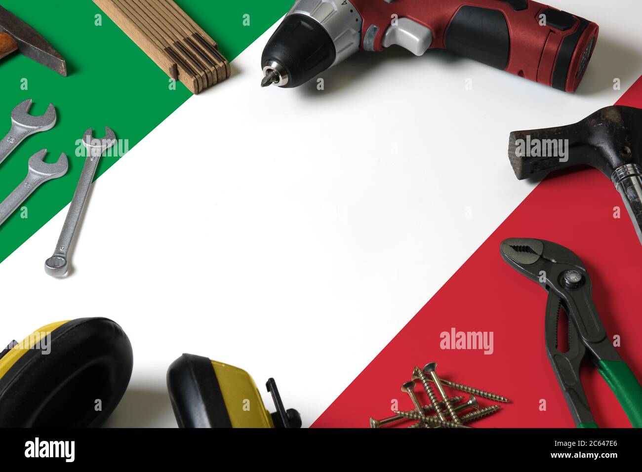 Italy flag on repair tool concept wooden table background. Mechanical ...