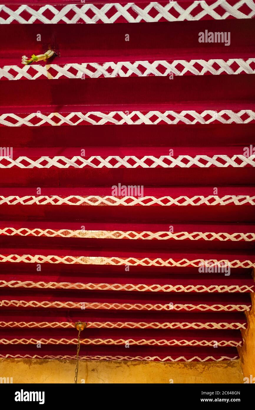 House ceiling in traditional Omani house with decorated beams and red ...