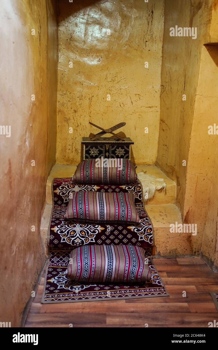 Traditional sofa made with carpet and cushions in steps inside a ...