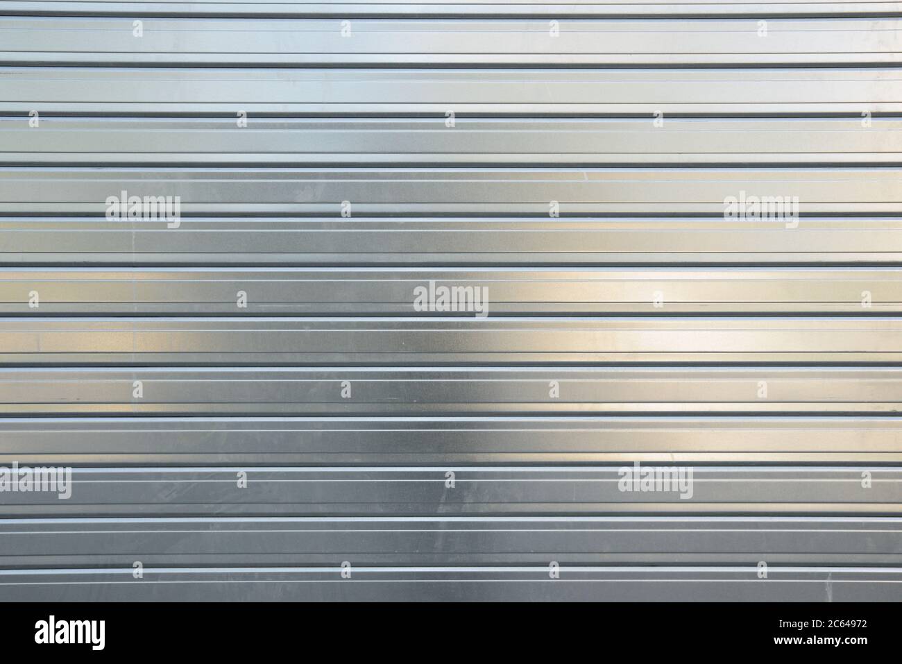 Front view of the metal roller shutter of a store Stock Photo - Alamy