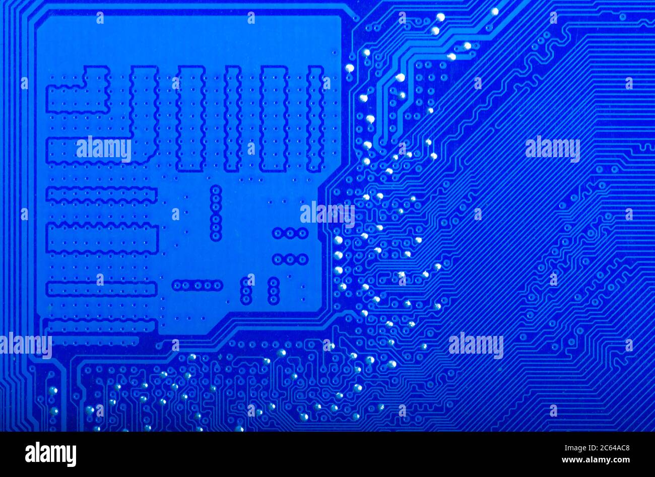 Circuit board with blue background Stock Photo - Alamy