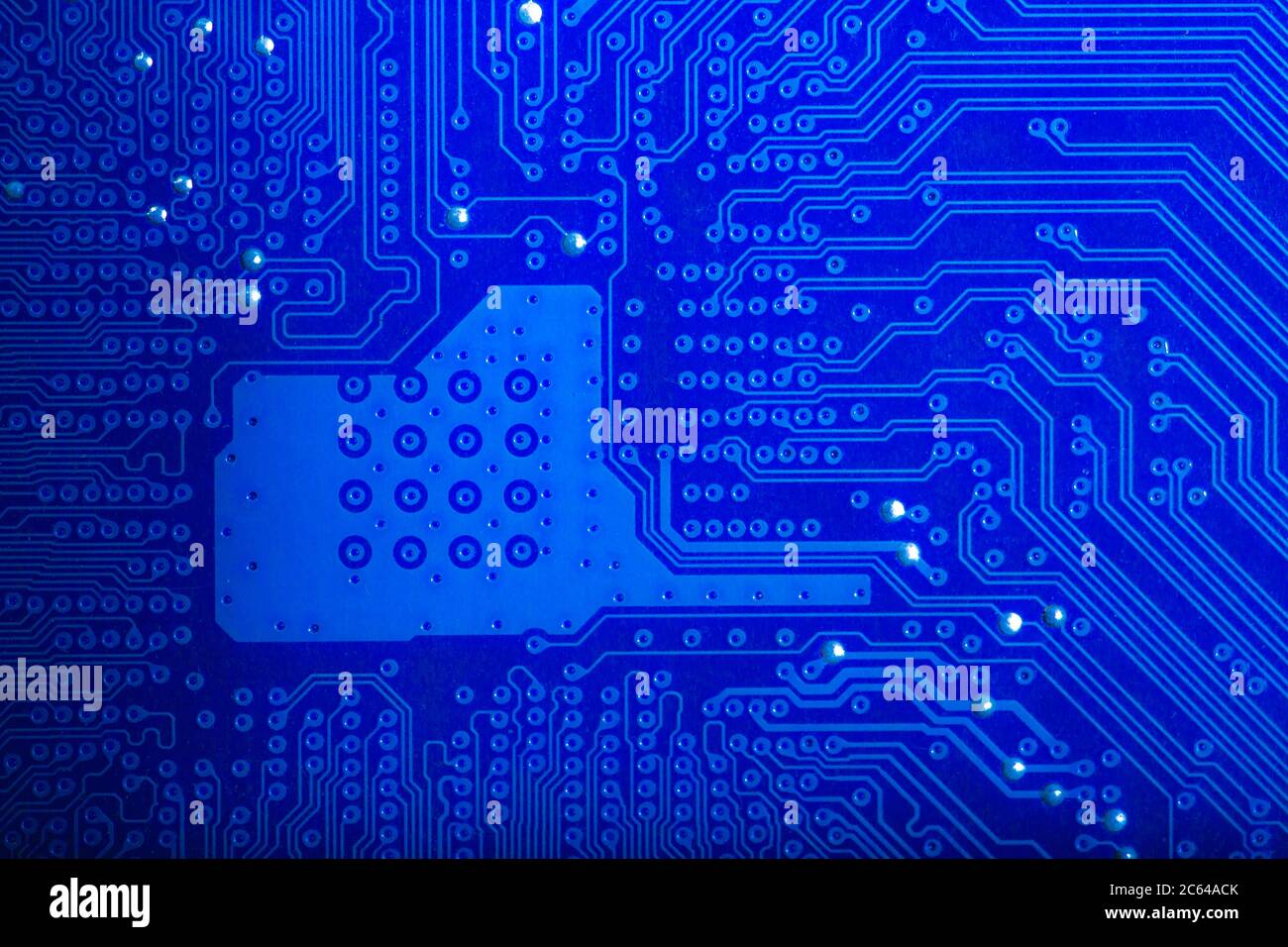 Circuit board with blue background Stock Photo - Alamy