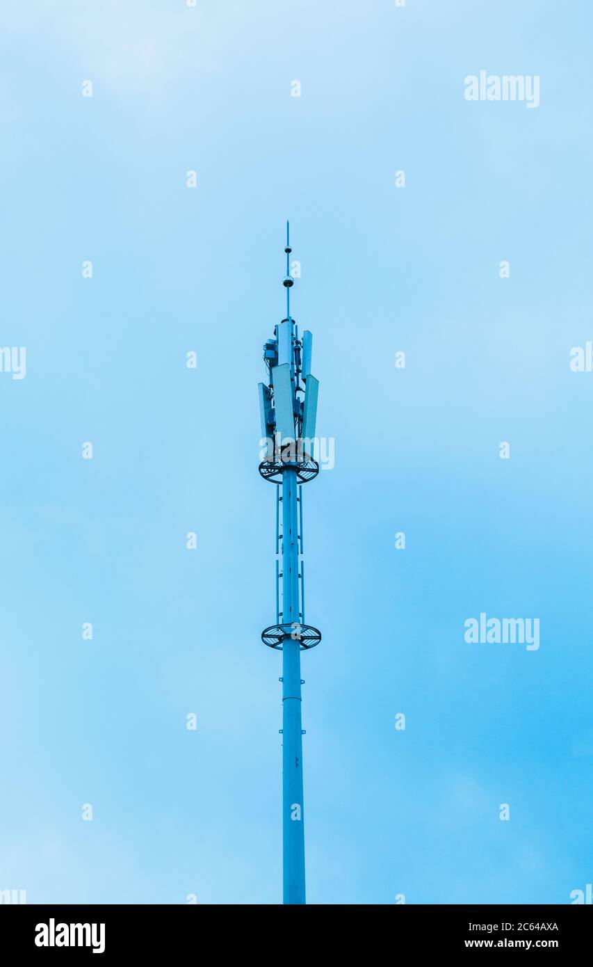 Outdoor mobile phone 4G5G signal relay station under blue background ...