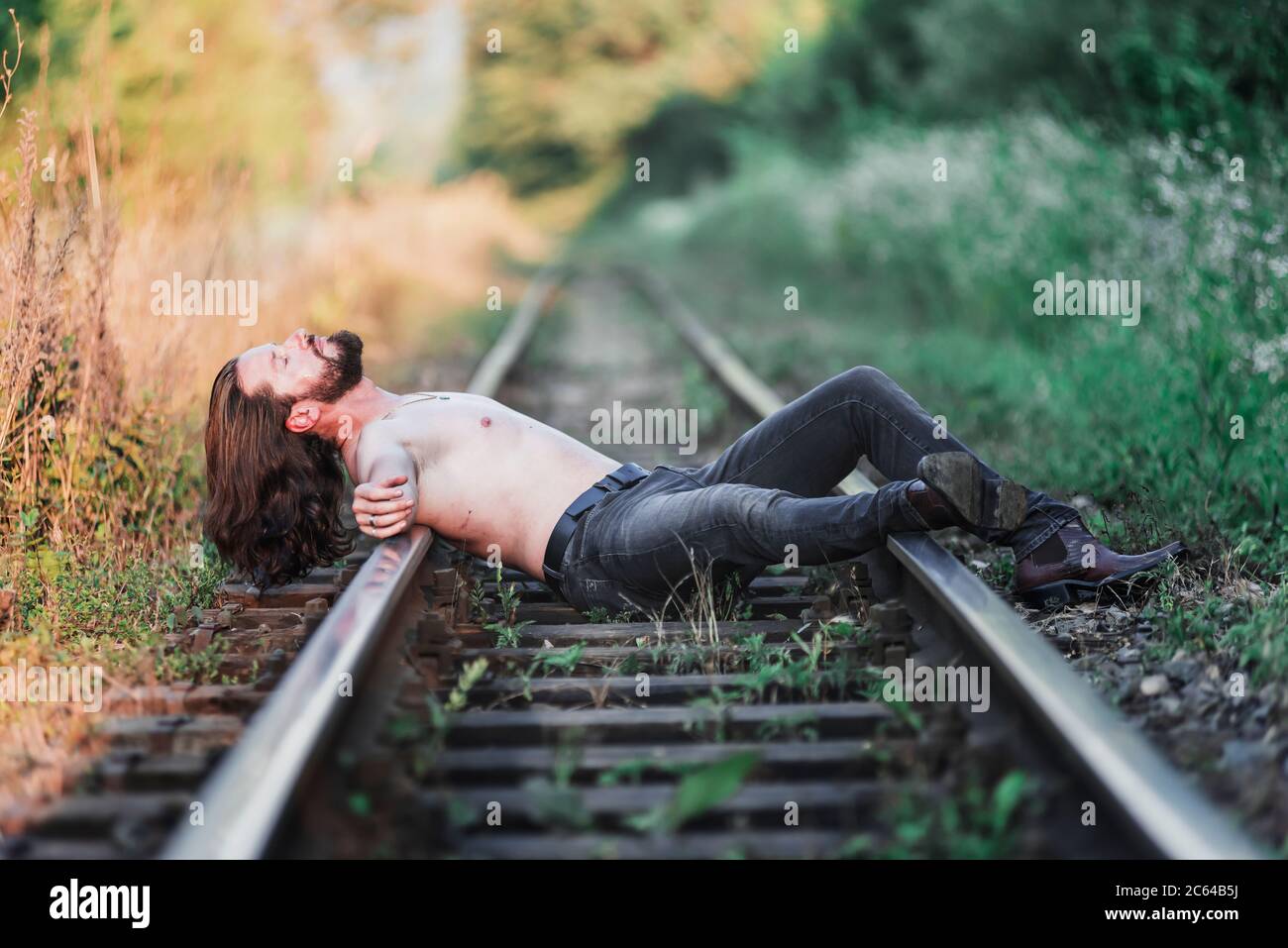 Portrait sad man lying hi-res stock photography and images - Alamy