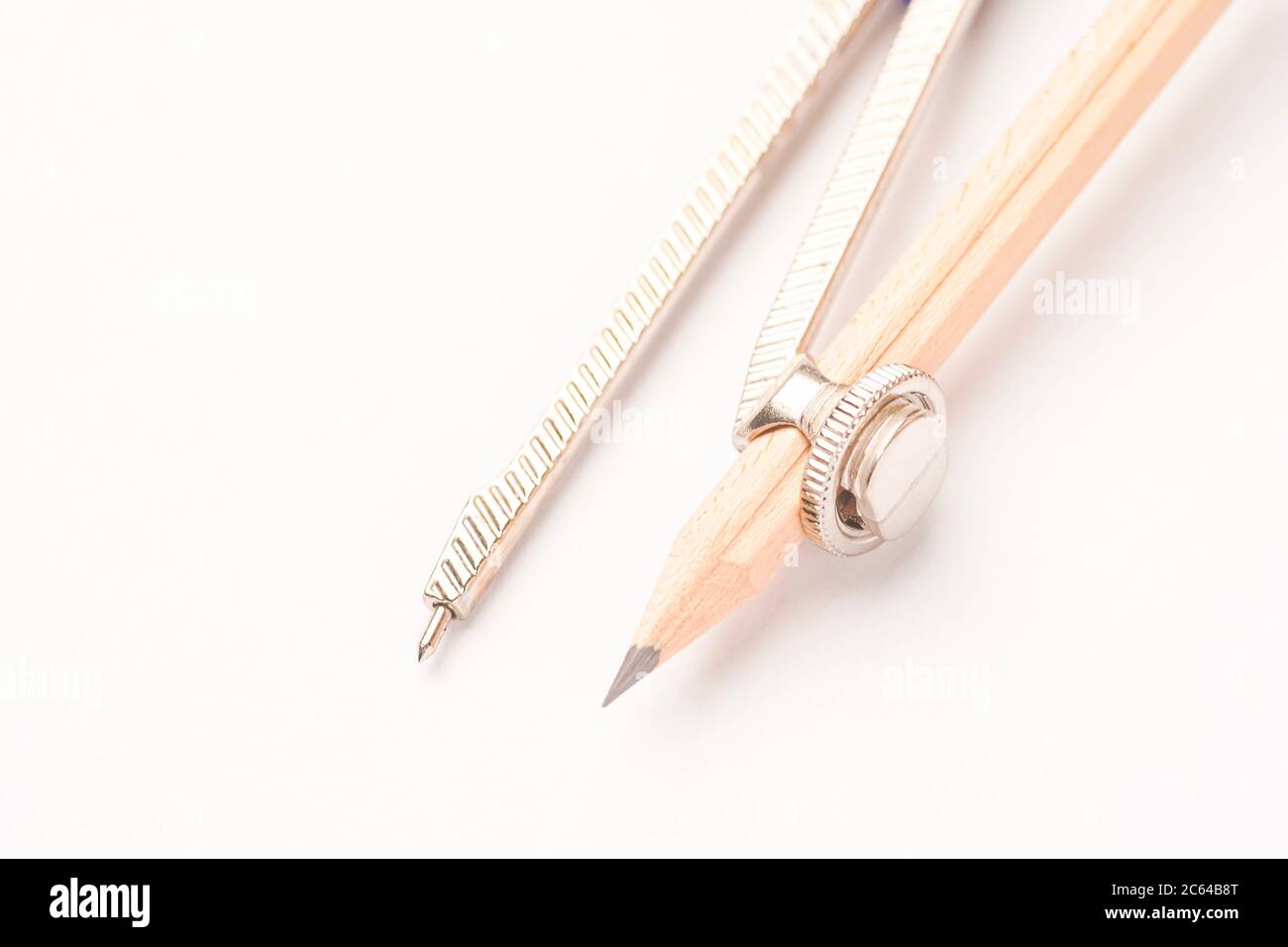A compass isolated against white Stock Photo - Alamy