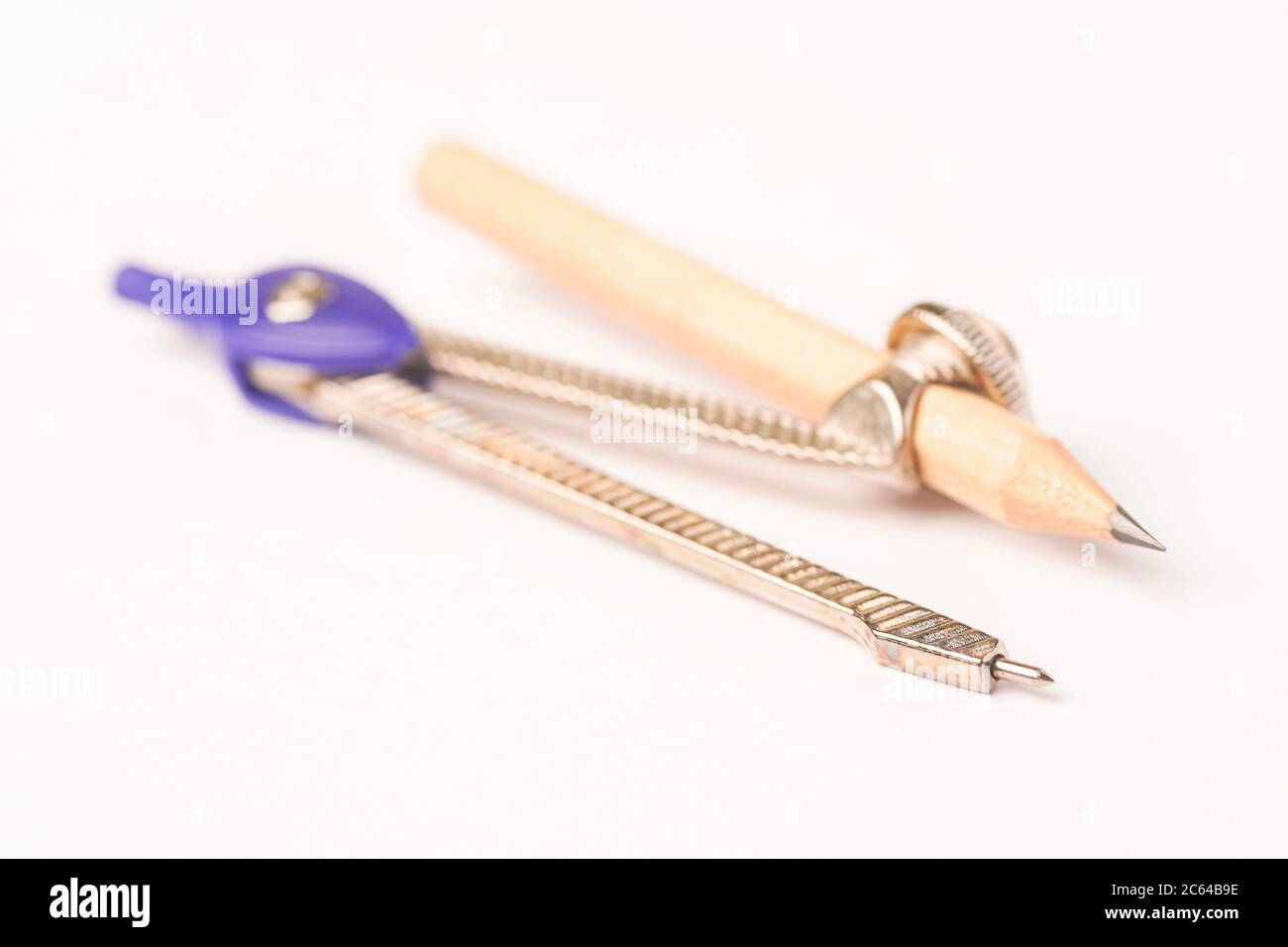 A compass isolated against white Stock Photo - Alamy