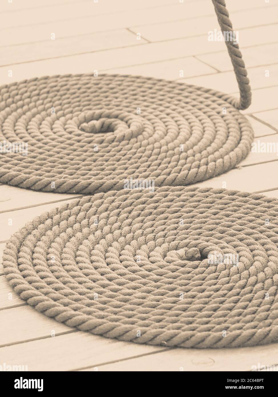 Old nautical objects concept. Circle rounded antique chest rope coil on ...
