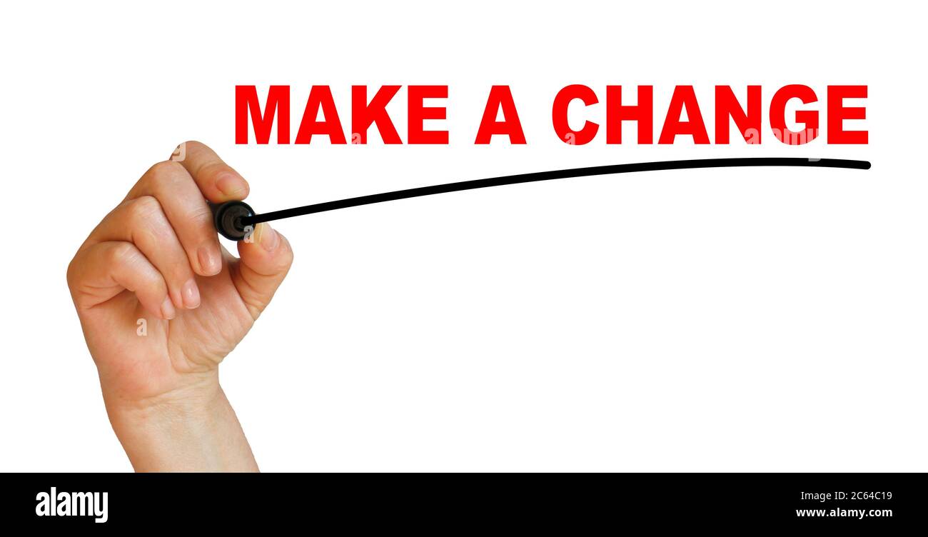Hand underlining make a change with red marker Stock Photo - Alamy