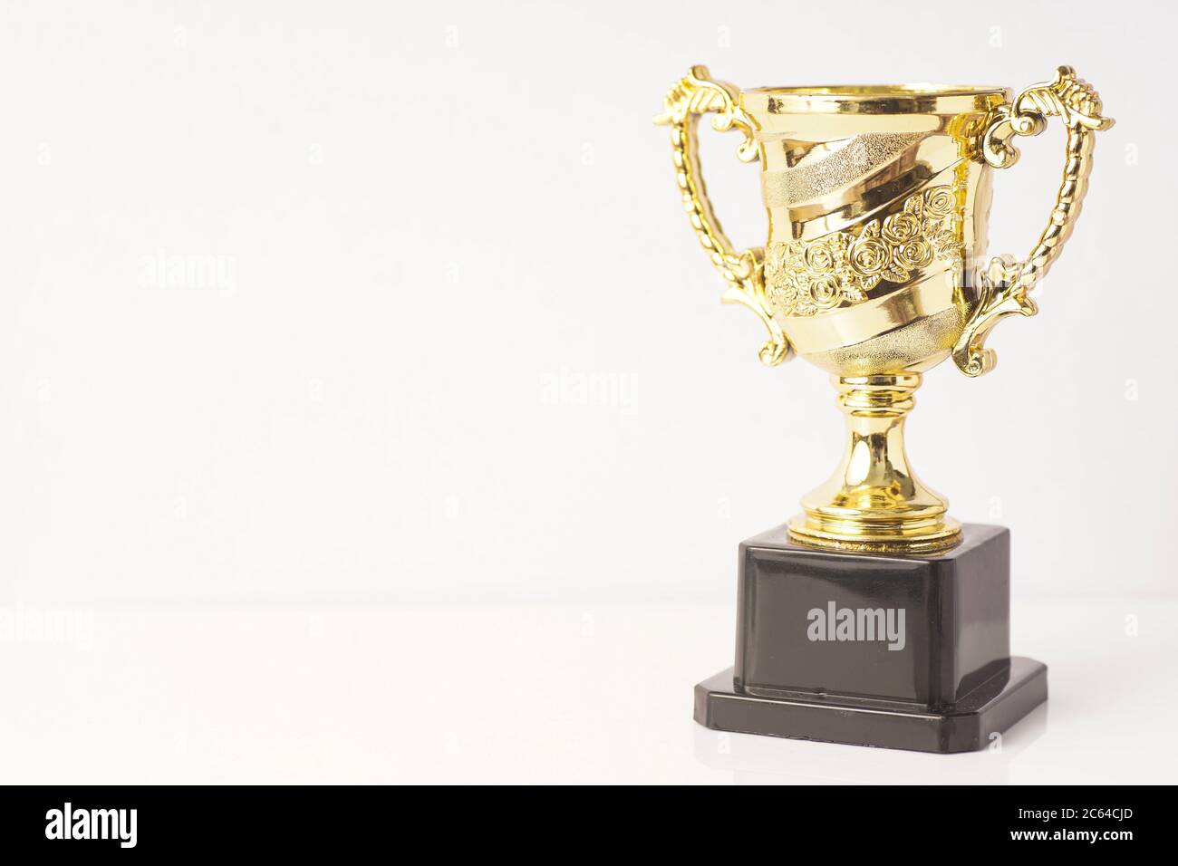 Isolated shot of trophy replica against white background Stock Photo ...