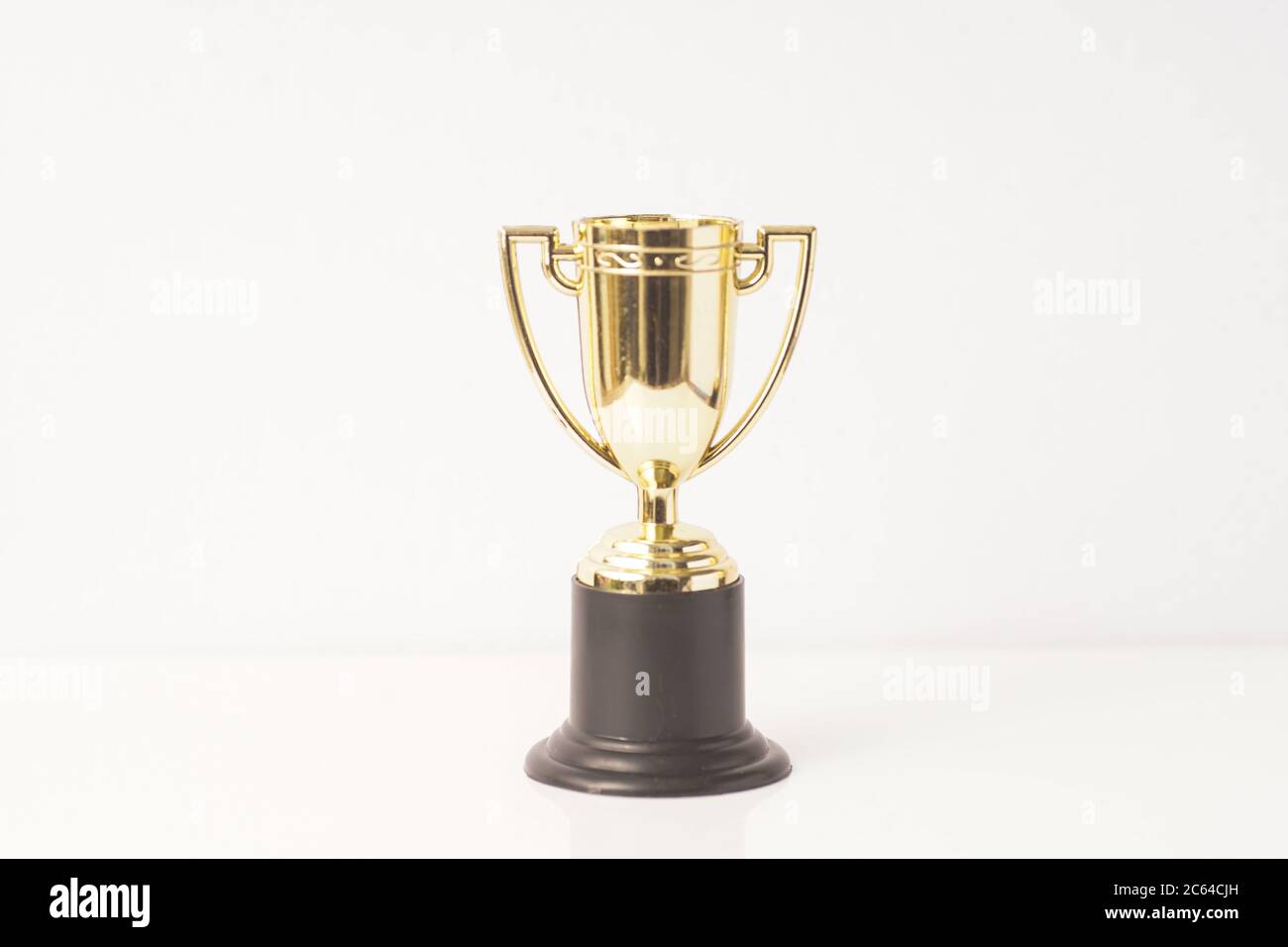 Isolated shot of trophy replica against white background Stock Photo ...