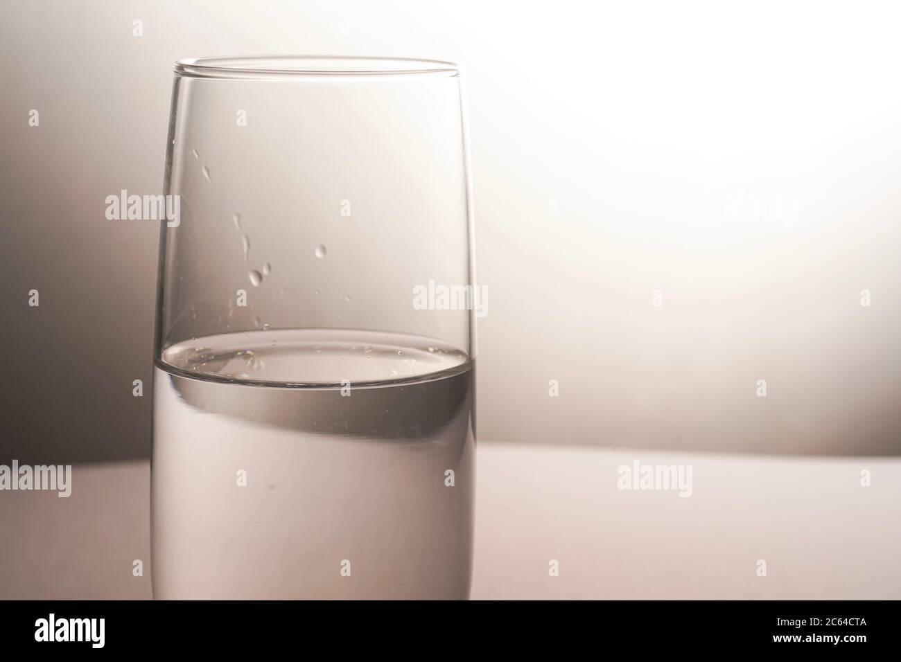 Glass half empty or glass half full. Psychology or motivational concept ...