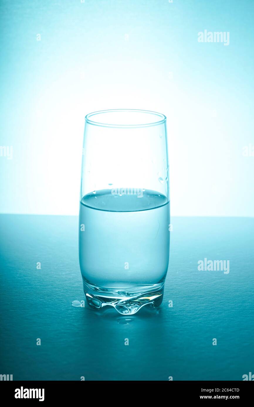 Glass half empty or glass half full. Psychology or motivational concept ...