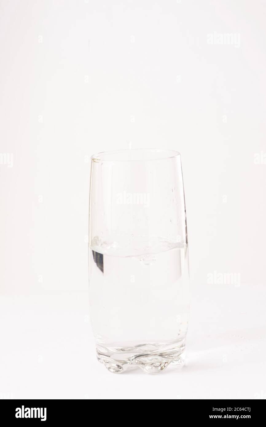 Glass half empty or glass half full. Psychology or motivational concept ...