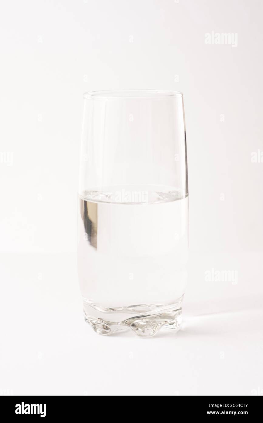 Glass half empty or glass half full. Psychology or motivational concept ...