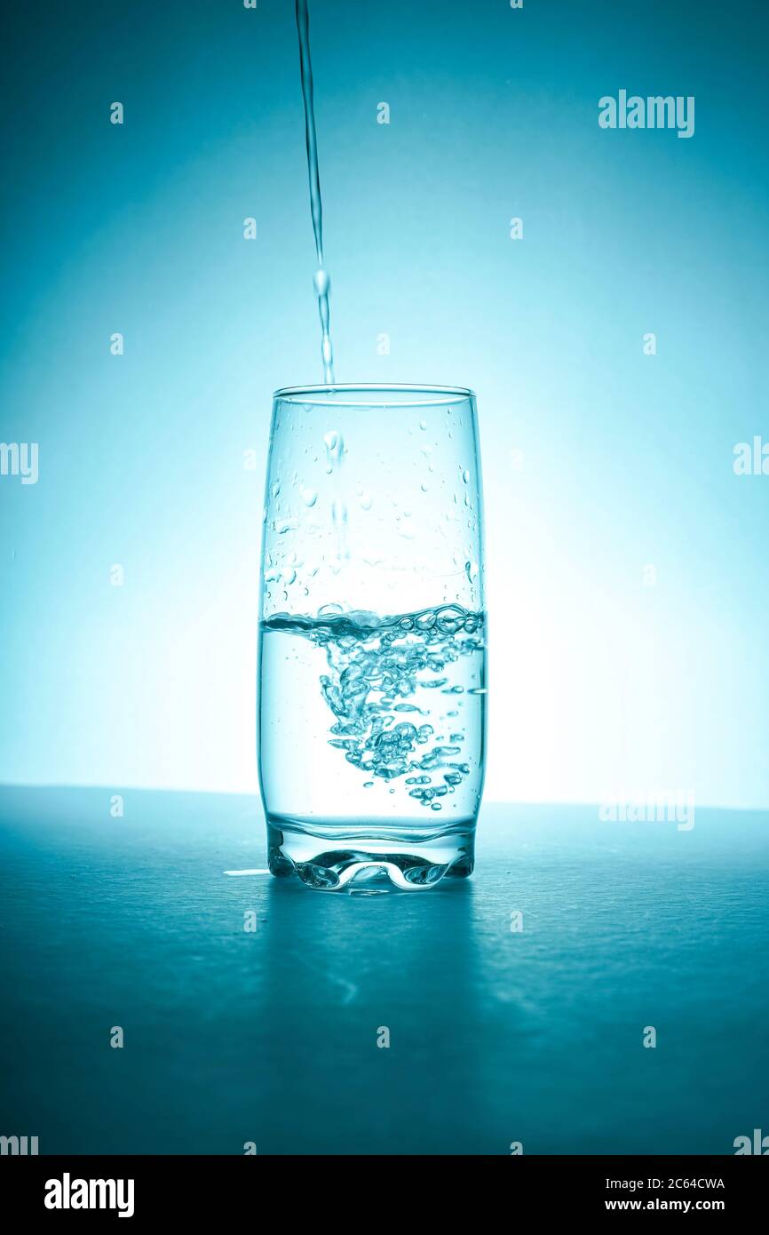 Glass half empty or glass half full. Psychology or motivational concept ...