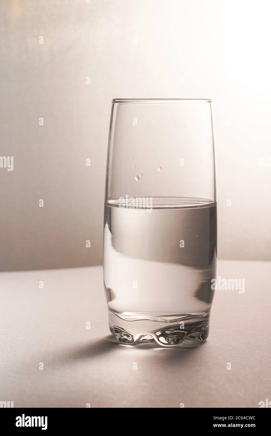 Glass half empty or glass half full. Psychology or motivational concept ...