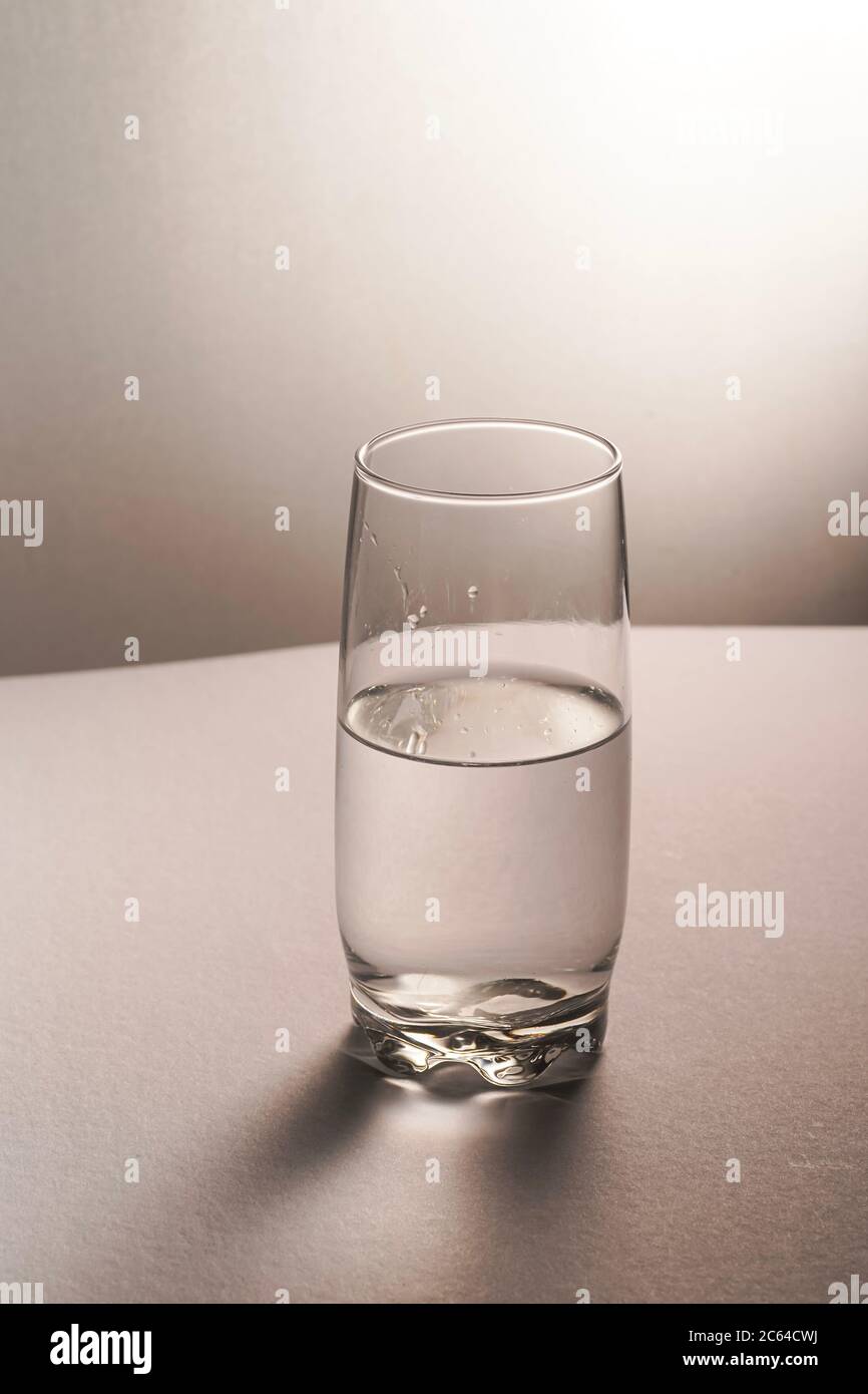 Glass half empty or glass half full. Psychology or motivational concept ...