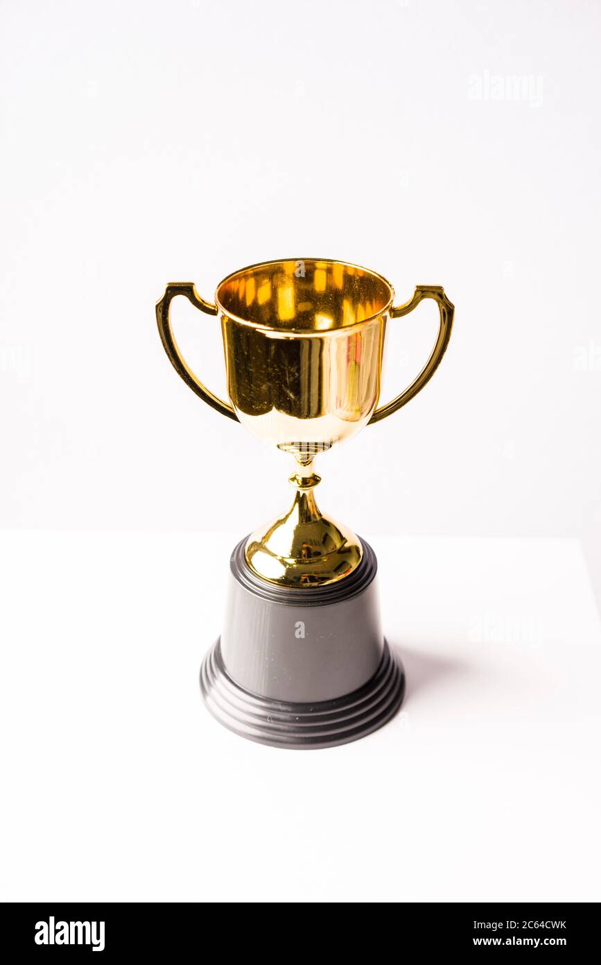 Isolated shot of trophy replica against white background Stock Photo ...