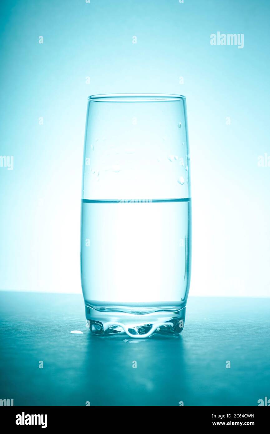 Glass half empty or glass half full. Psychology or motivational concept ...
