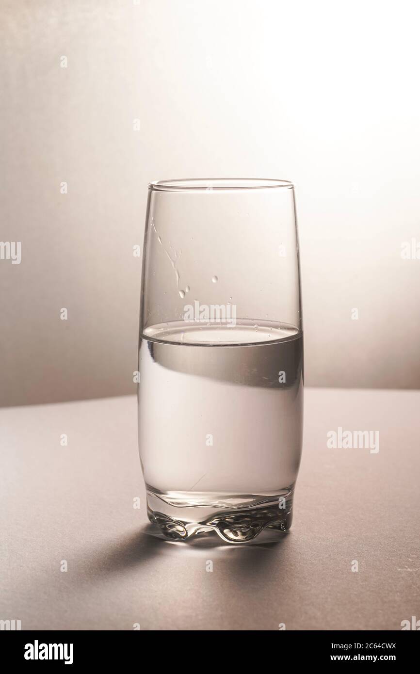 Glass half empty or glass half full. Psychology or motivational concept ...