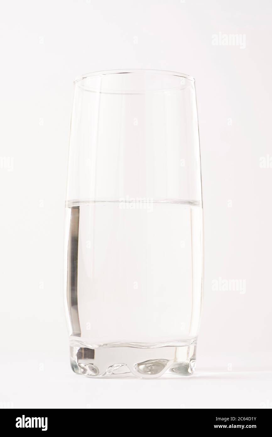 Glass half empty or glass half full. Psychology or motivational concept ...