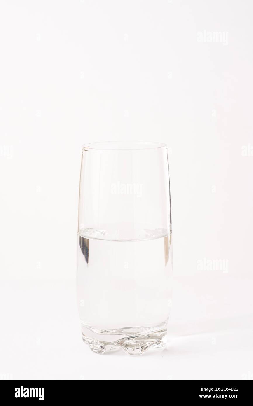 Glass half empty or glass half full. Psychology or motivational concept ...