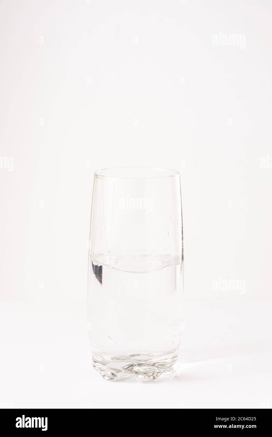 Glass half empty or glass half full. Psychology or motivational concept ...