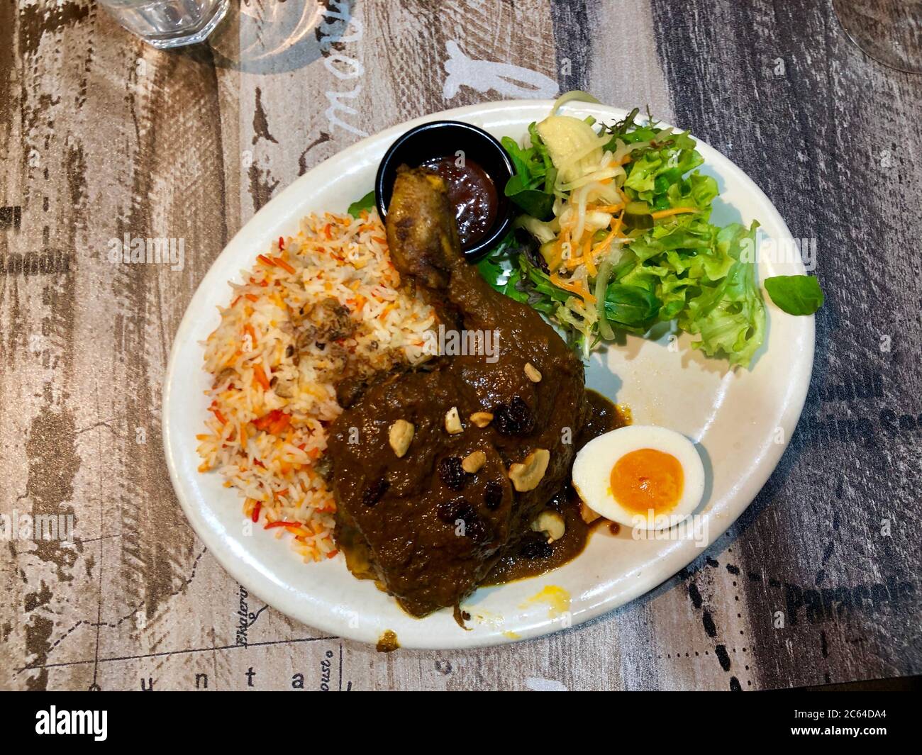 A plate of chicken Biryani on a table Stock Photo - Alamy