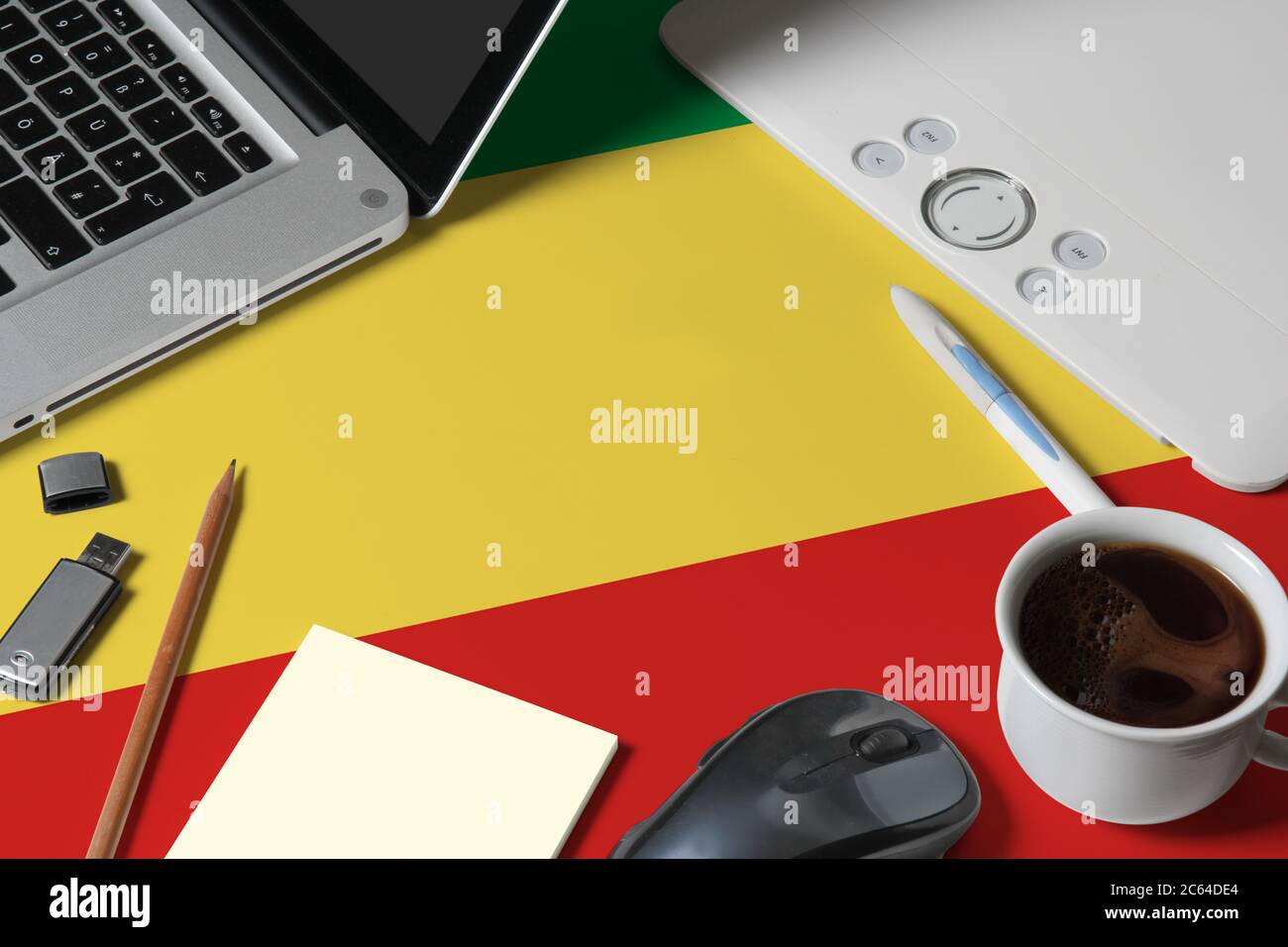 Republic Of The Congo national flag on top view work space of creative ...