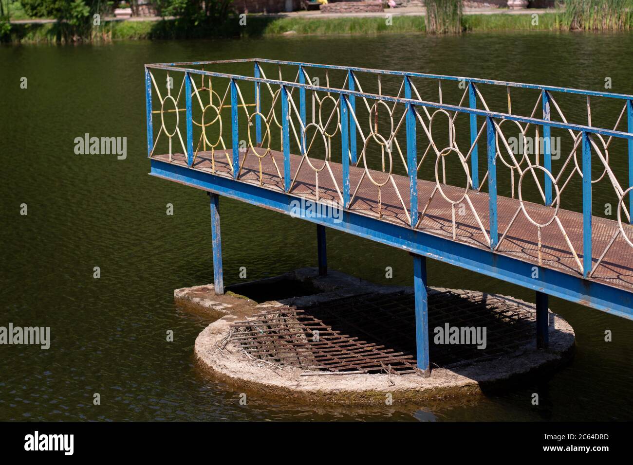 an iron pier over the lake Stock Photo - Alamy