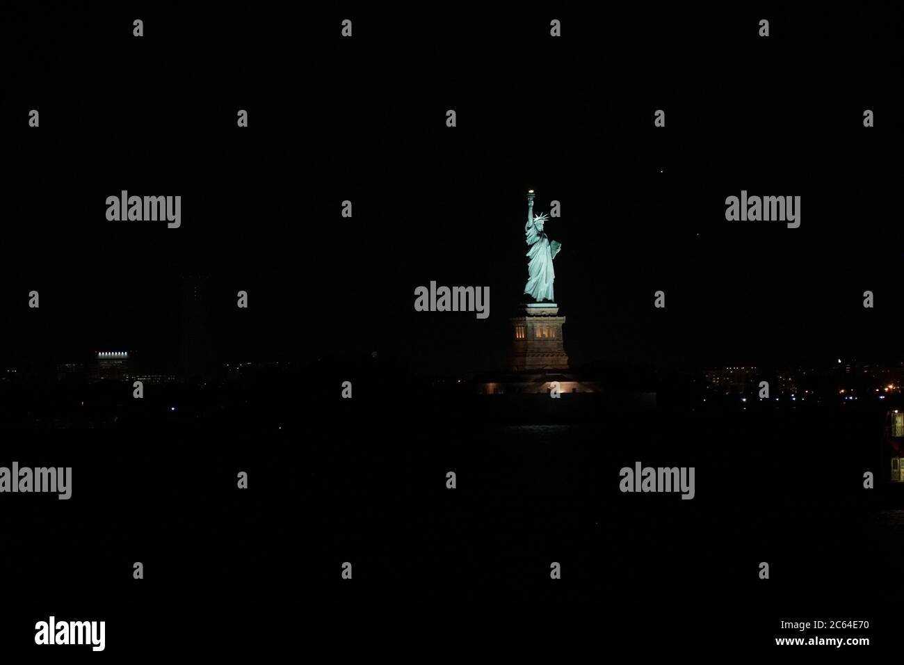 Statue of Liberty at night Stock Photo - Alamy