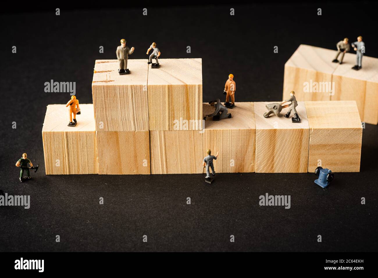 Miniature Builder Figures with wooden blocks, Labour Day Concept Stock ...