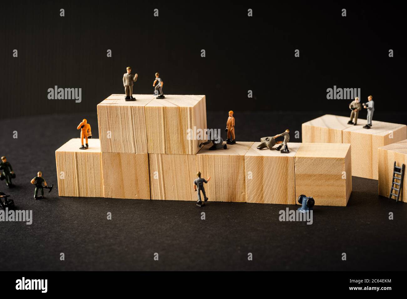 Miniature Builder Figures with wooden blocks, Labour Day Concept Stock ...