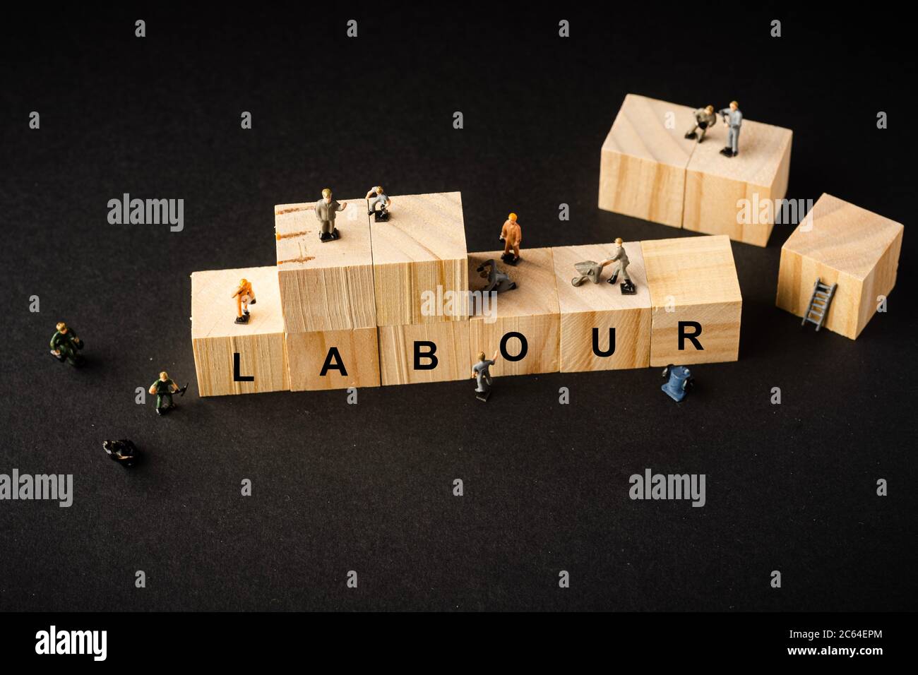 Miniature Builder Figure with wooden blocks and “LABOUR” wordings ...
