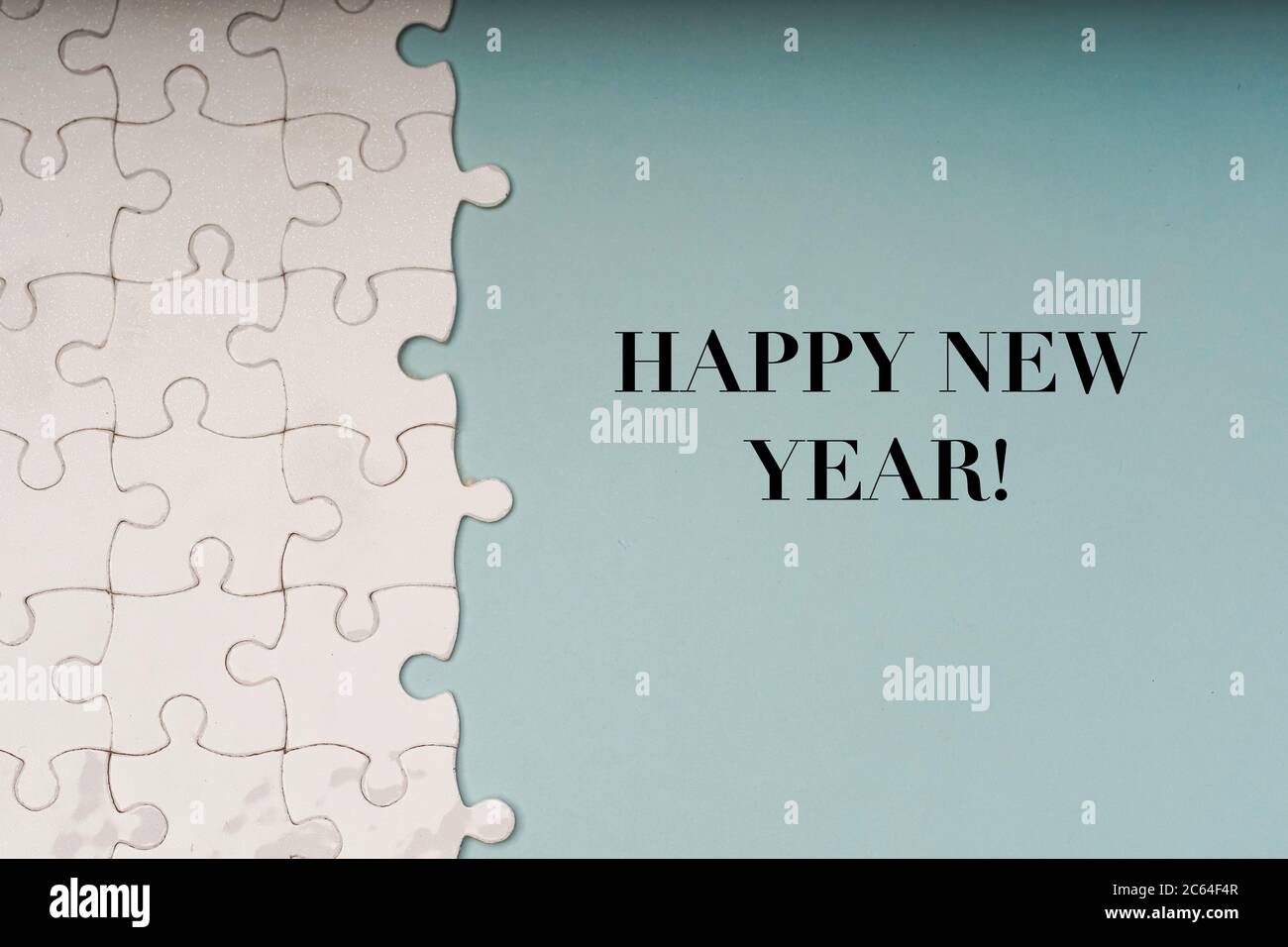 Happy New Year wordings with puzzle pieces Stock Photo - Alamy