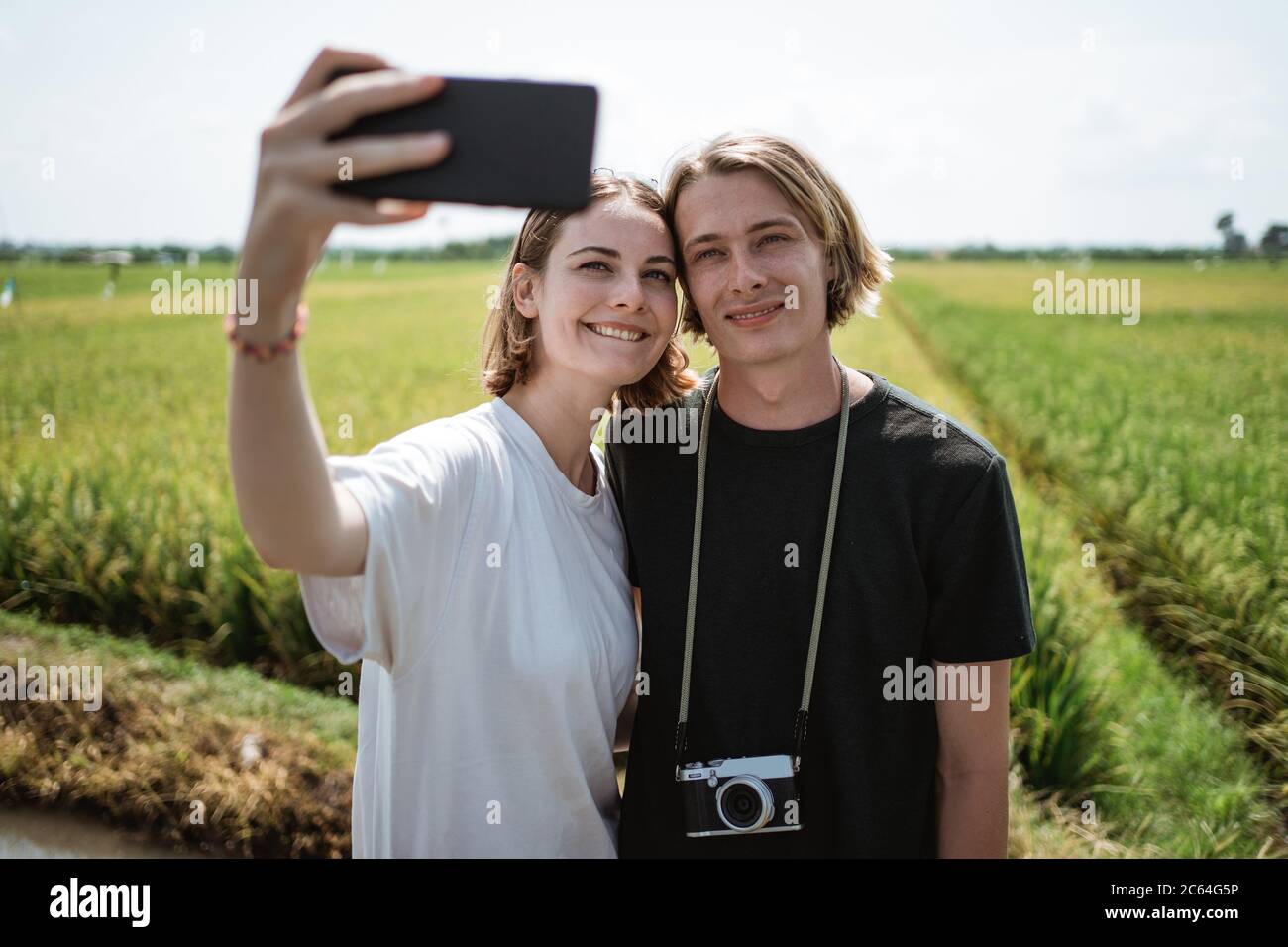 Couple in a rice field hi-res stock photography and images - Alamy
