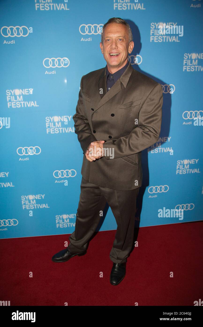 Actor Simon Burke arrives on the red carpet for the opening night of ...