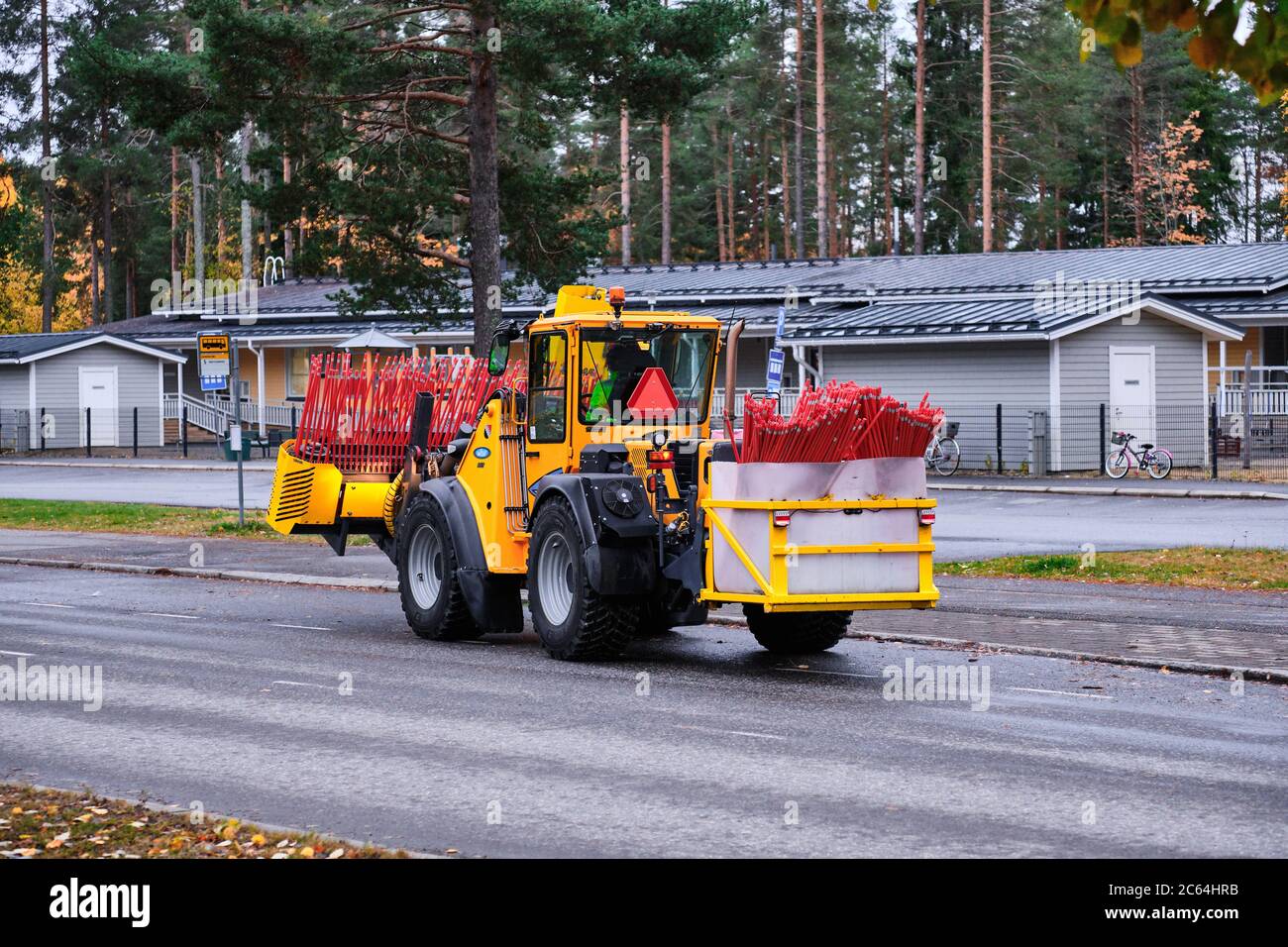 Joensuu, Finland - 15 October, 2019: Tractor with a machine for ...