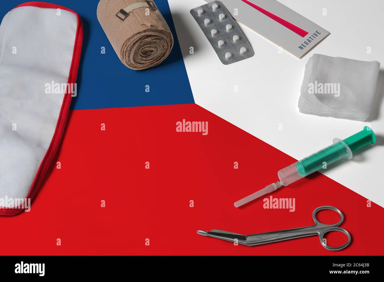 Czech Republic flag with first aid medical kit on wooden table ...