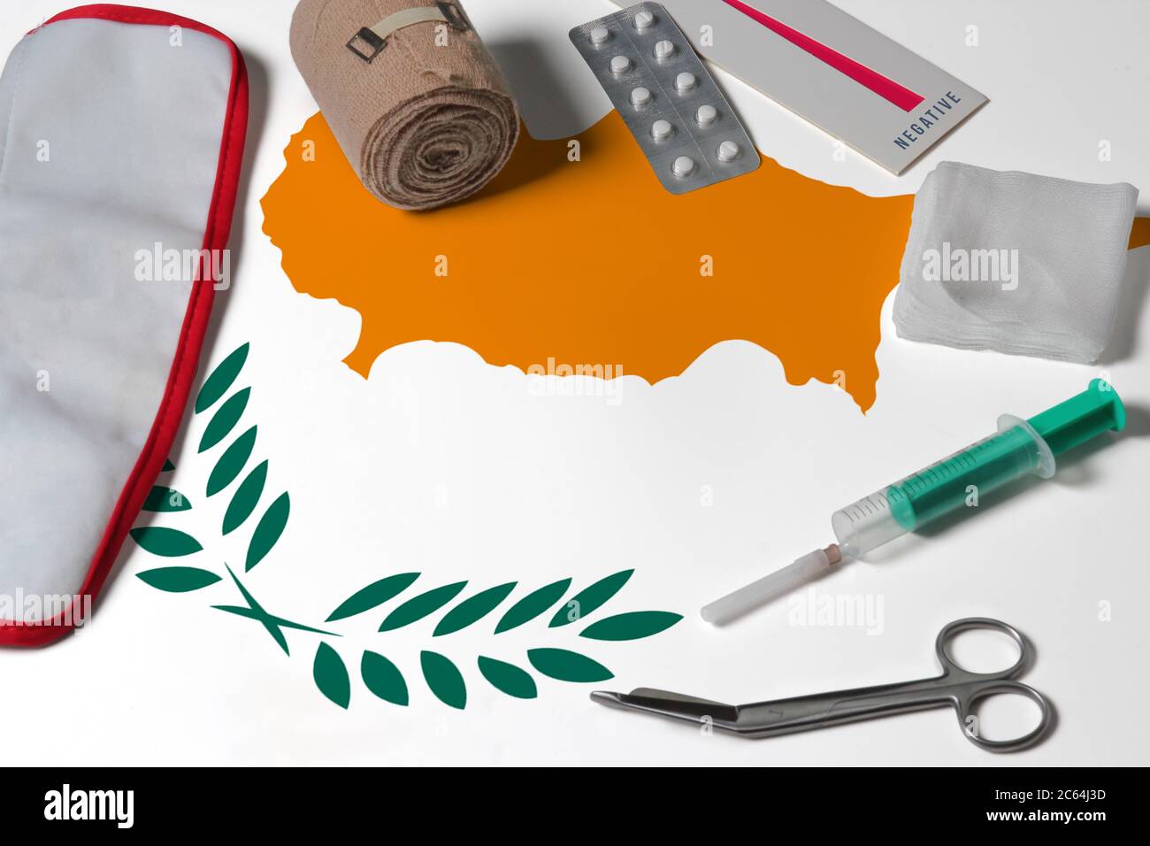 Cyprus flag with first aid medical kit on wooden table background ...