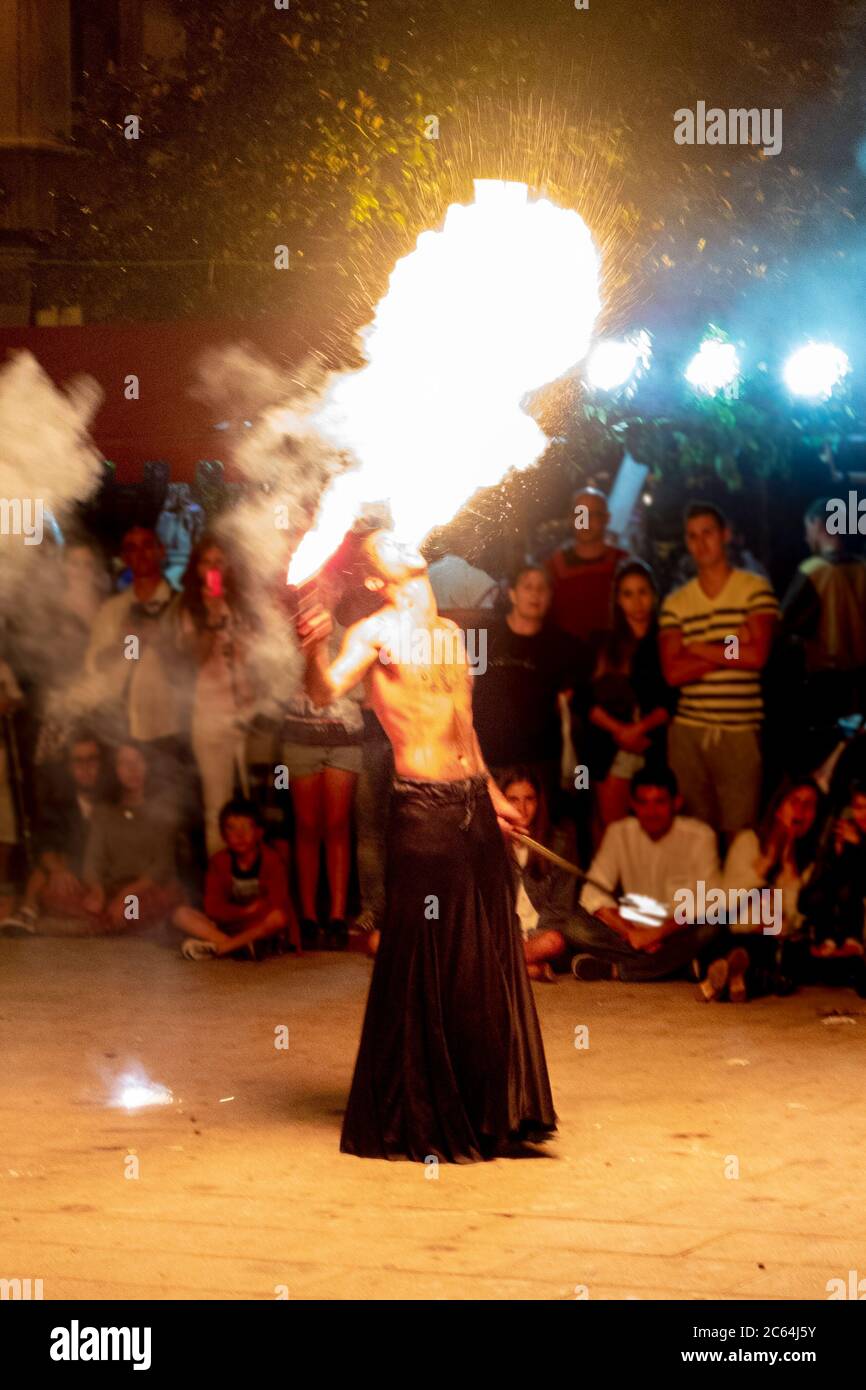fire-swallower. or fire eater performing Stock Photo - Alamy