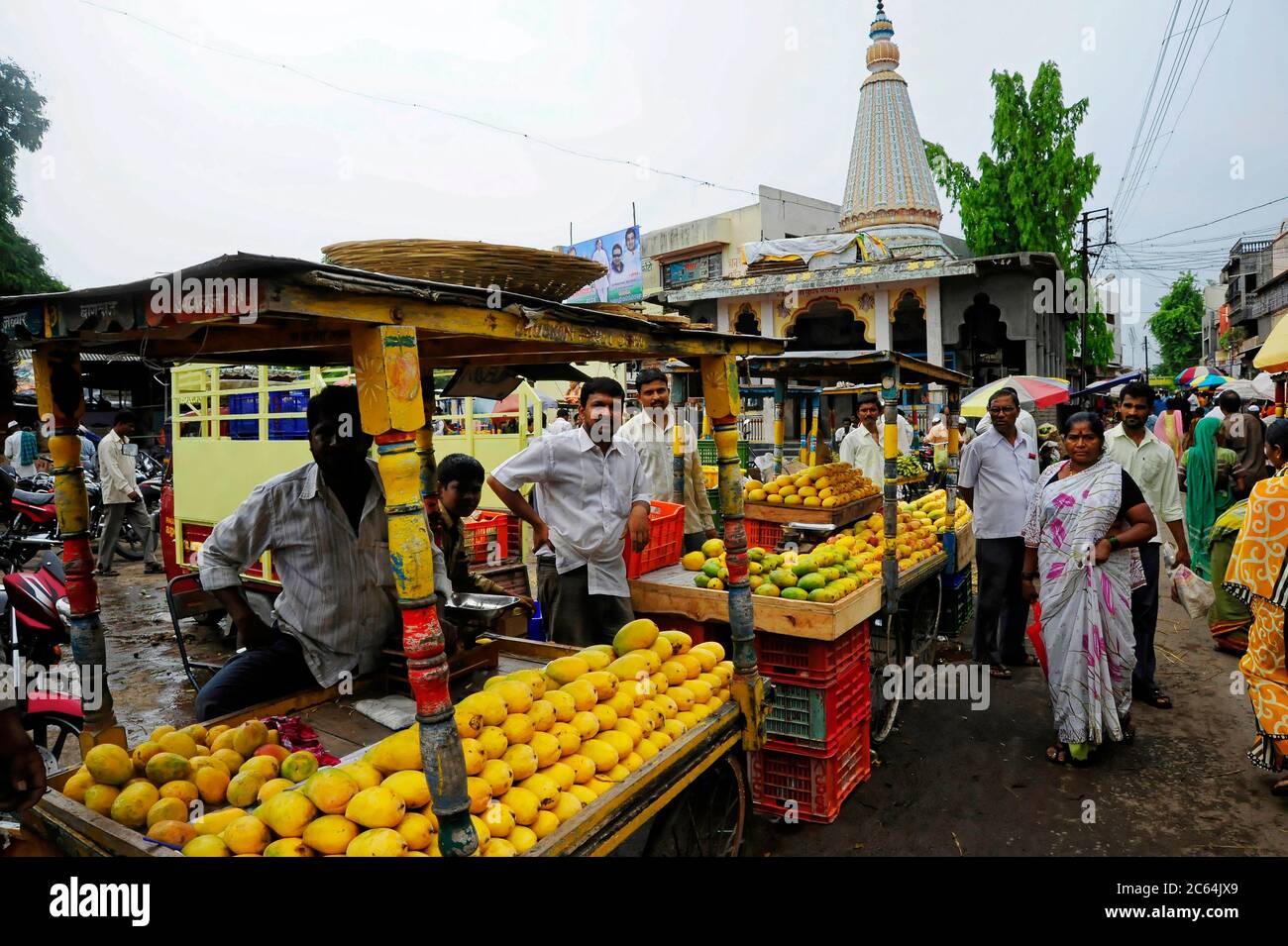 Street vendors selling vegetables and fruits at street Stock Photo - Alamy
