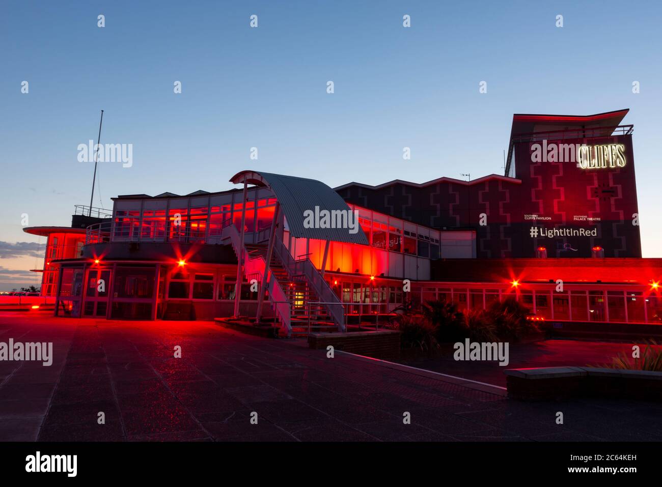 Cliffs Pavilion theatre illuminated red in support of the entertainment ...
