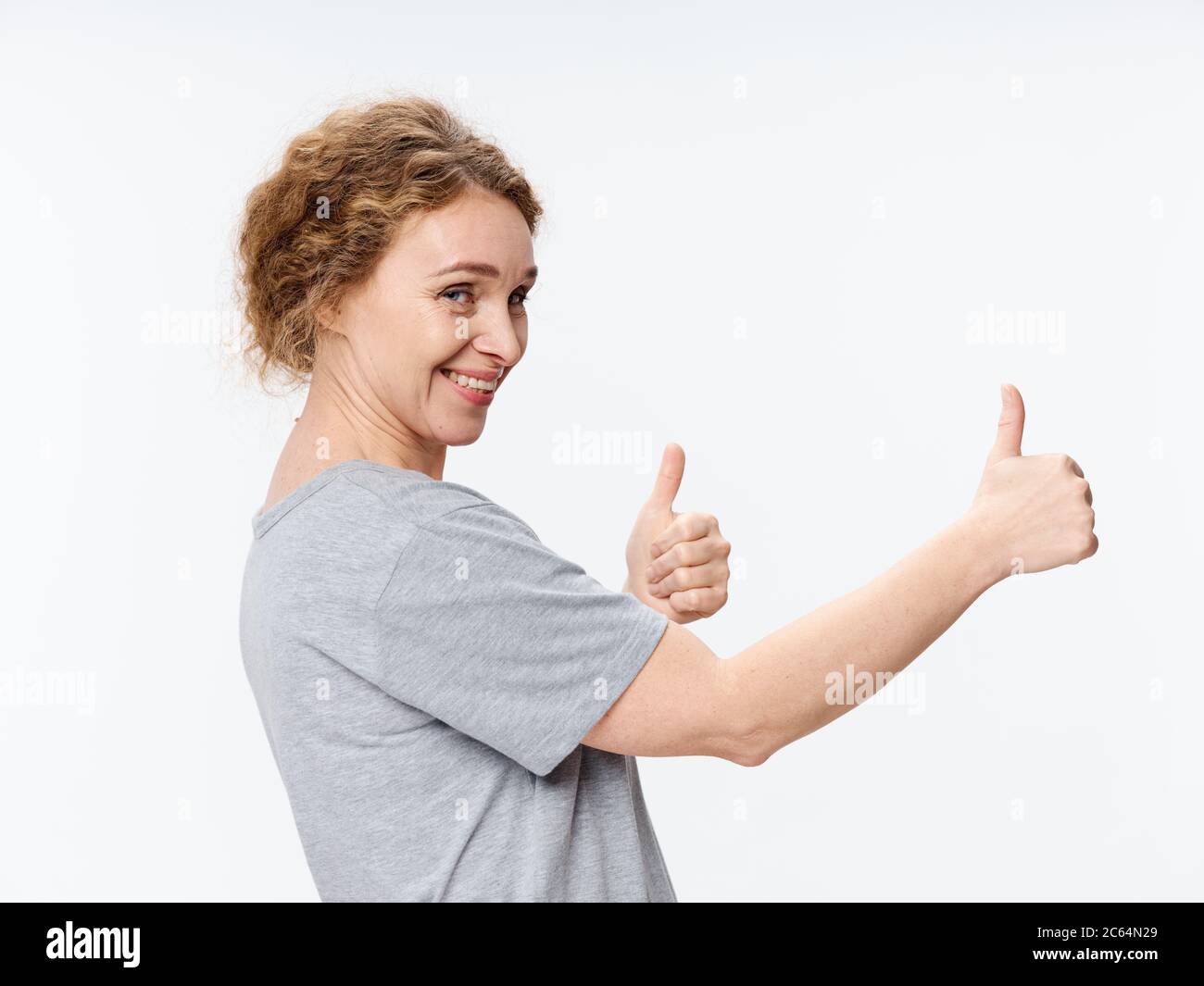 Happy woman with wrinkles on her face Stock Photo - Alamy