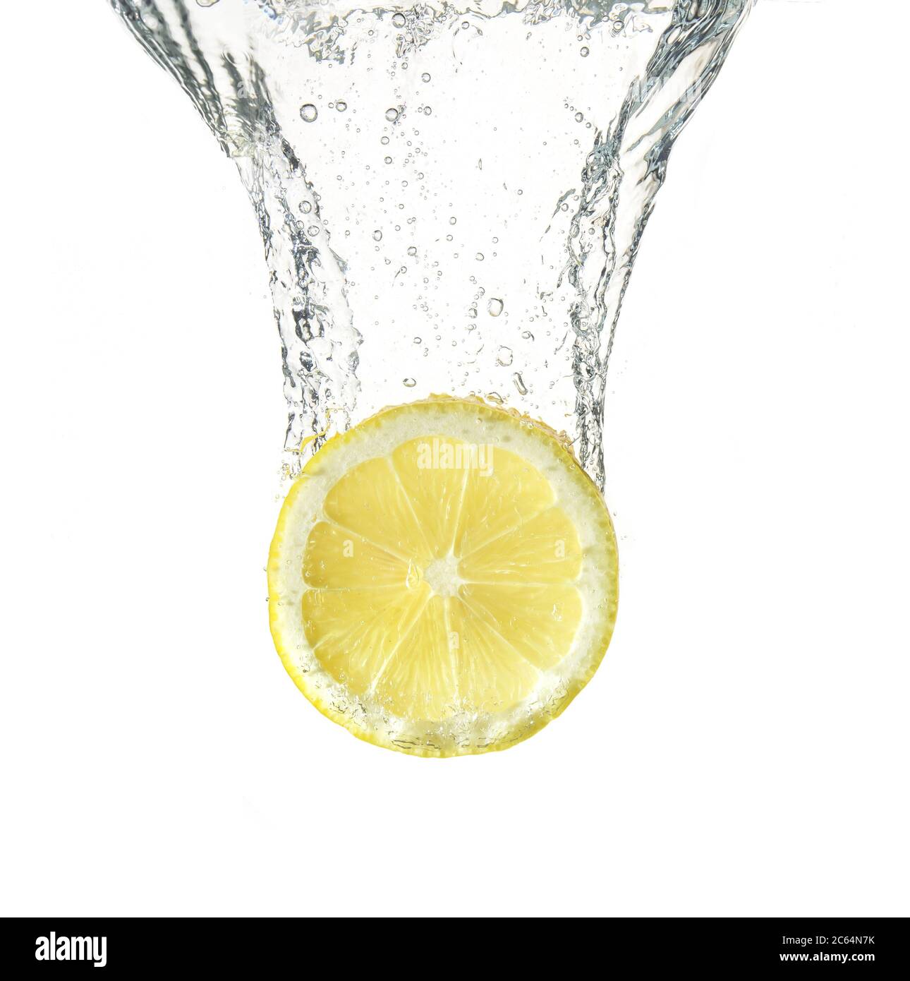 slice of ripe lemon falling into water Stock Photo - Alamy