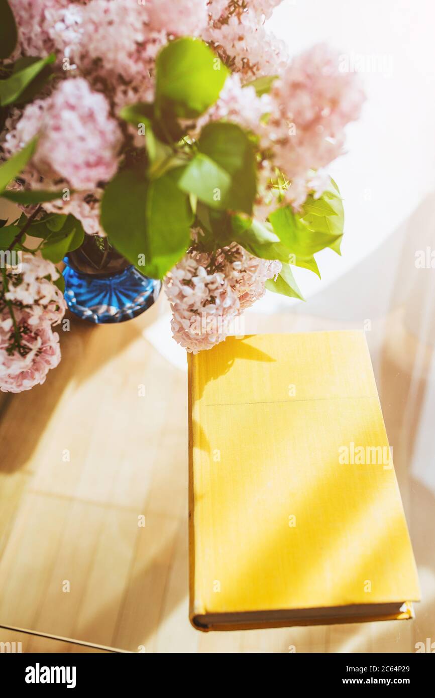 Book fiction volume - love story on a morning table with a bouquet of ...