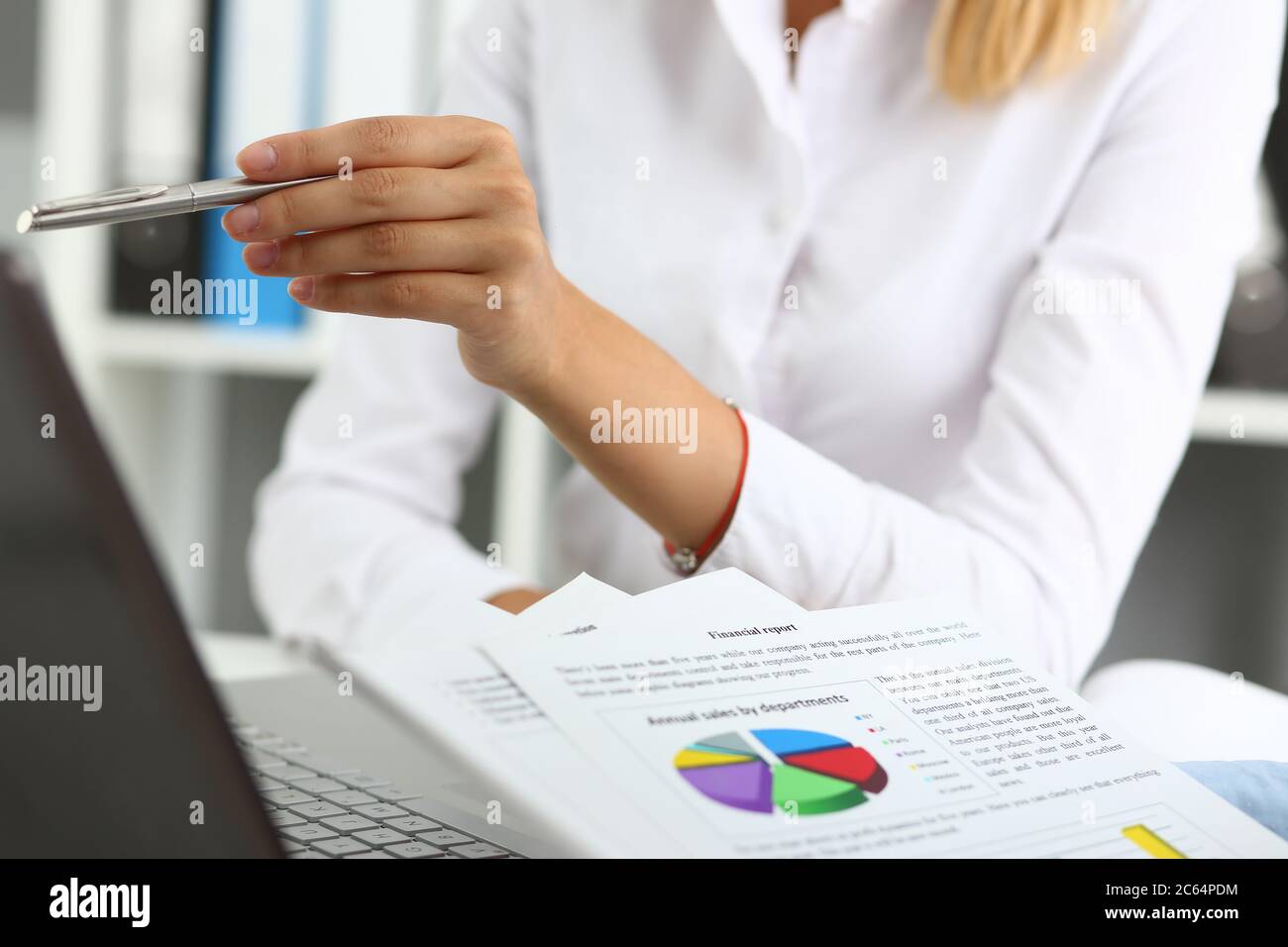 Professional young lady pointing laptop hi-res stock photography and ...