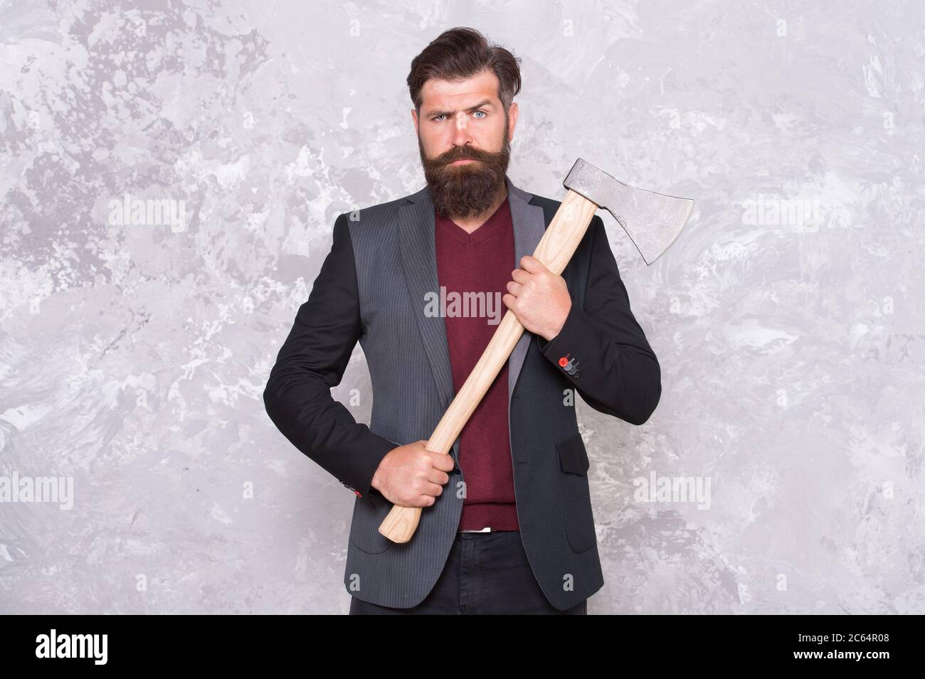 Keep the wild in you. Bearded man hold axe abstract background. Brutal ...