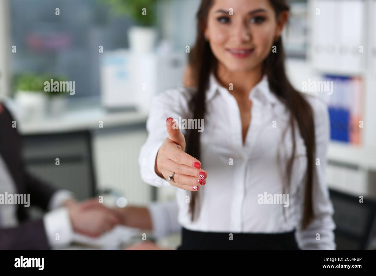 Smiling confident lady standing hi-res stock photography and images - Alamy